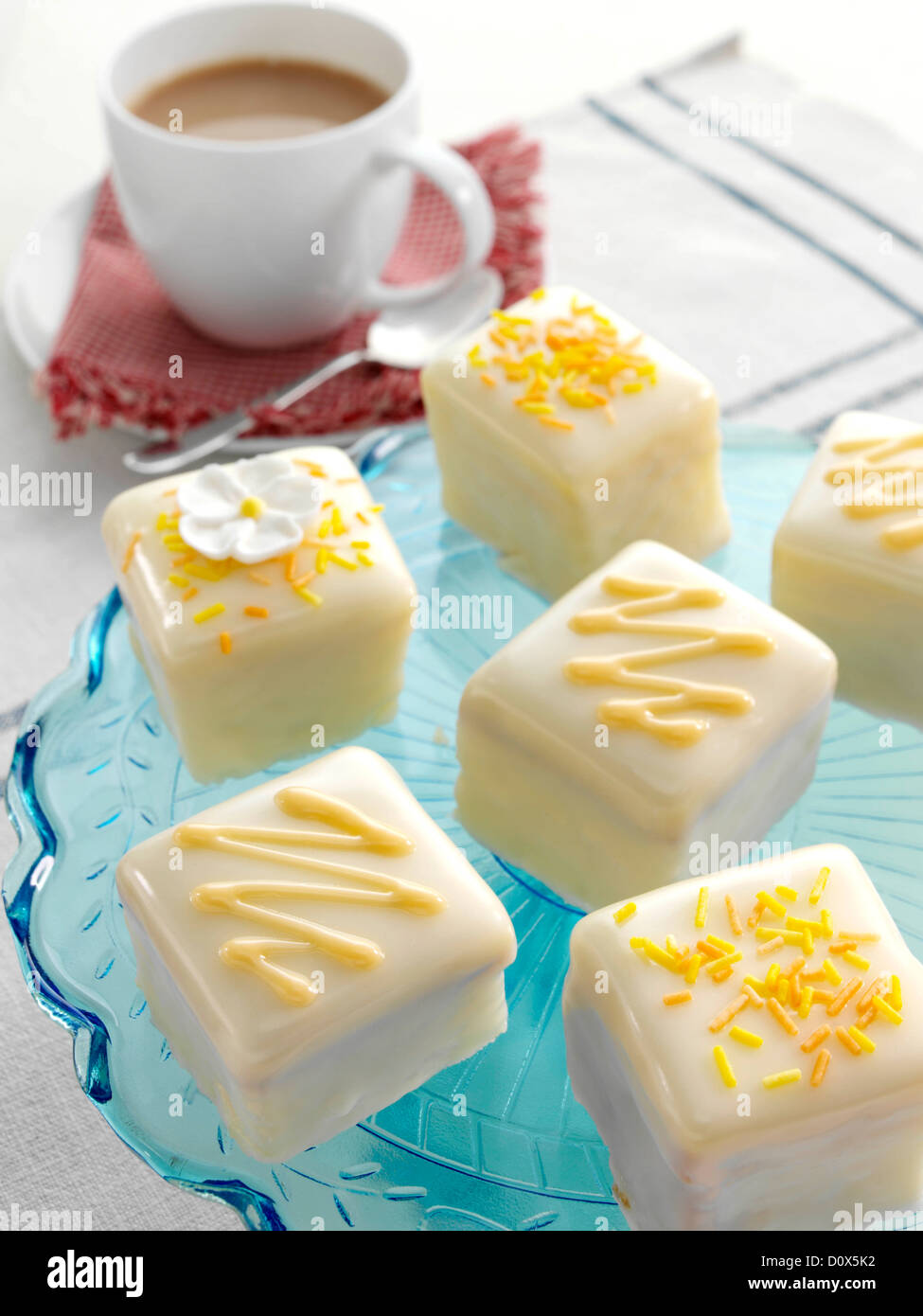 Orange flavoured fondant fancies Great British bake off Stock Photo - Alamy