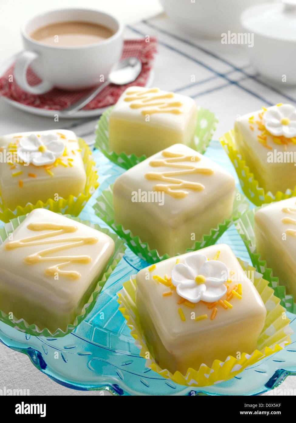 Frosted decorated fondant fancies individual cakes hi-res stock ...