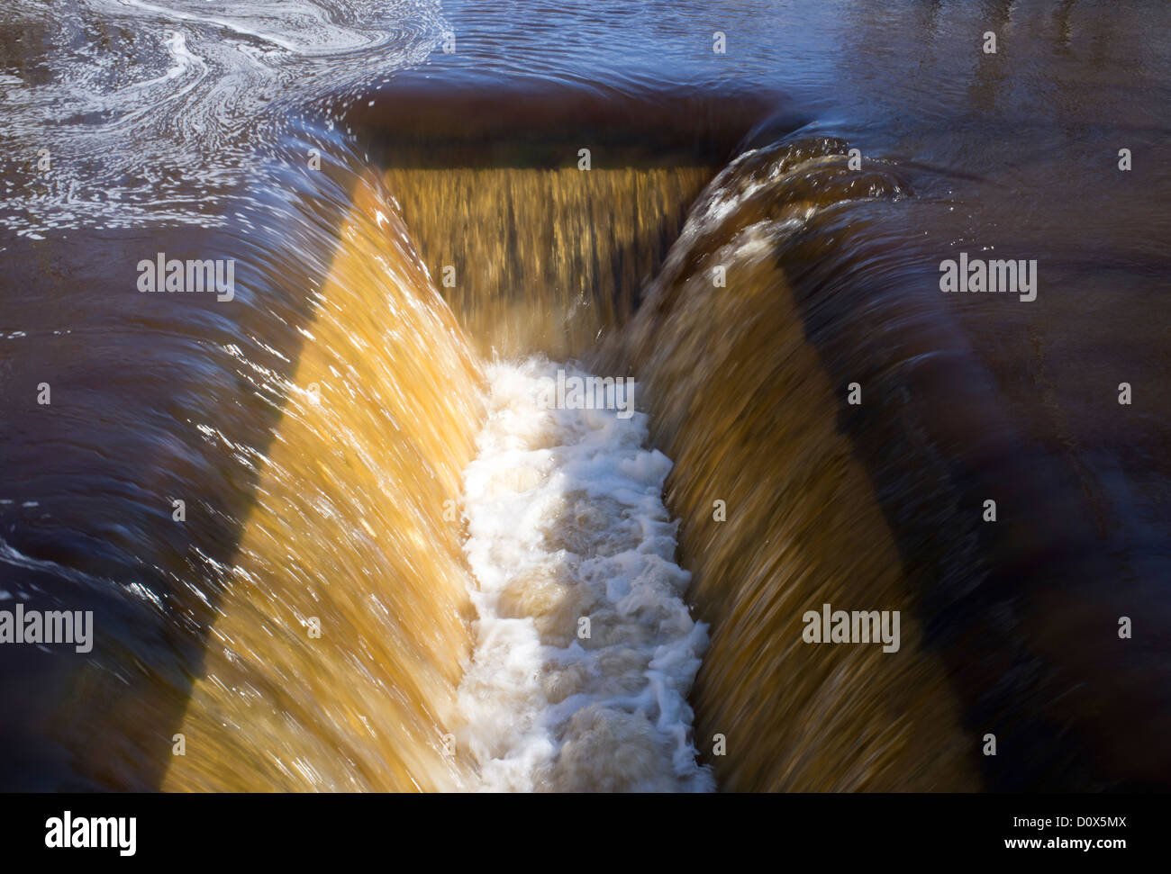 Opening to the underground drainage system Stock Photo - Alamy