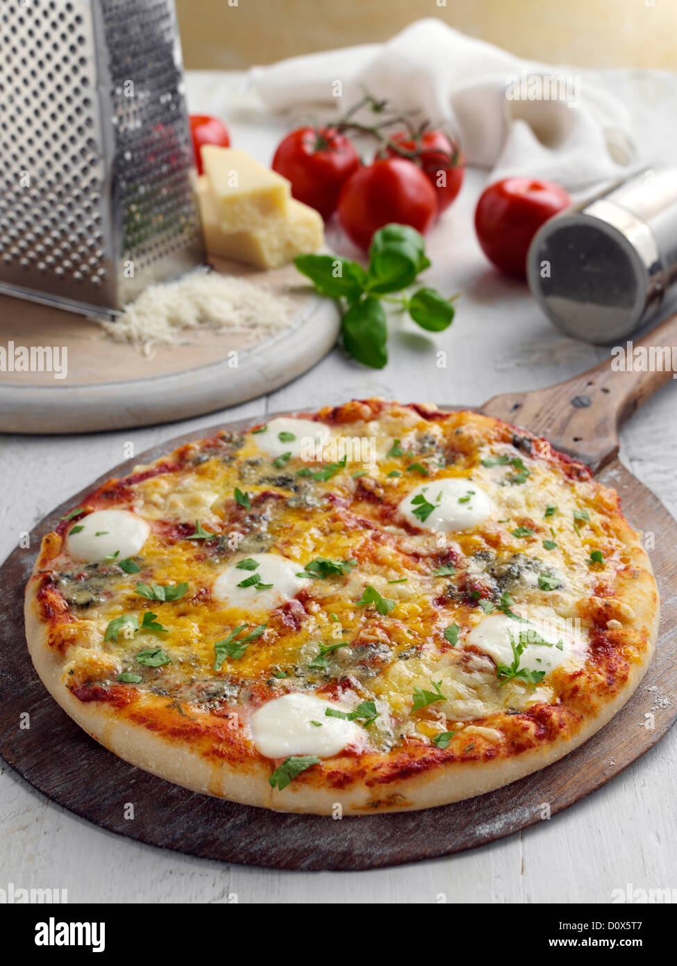 Four cheeses pizza Stock Photo - Alamy