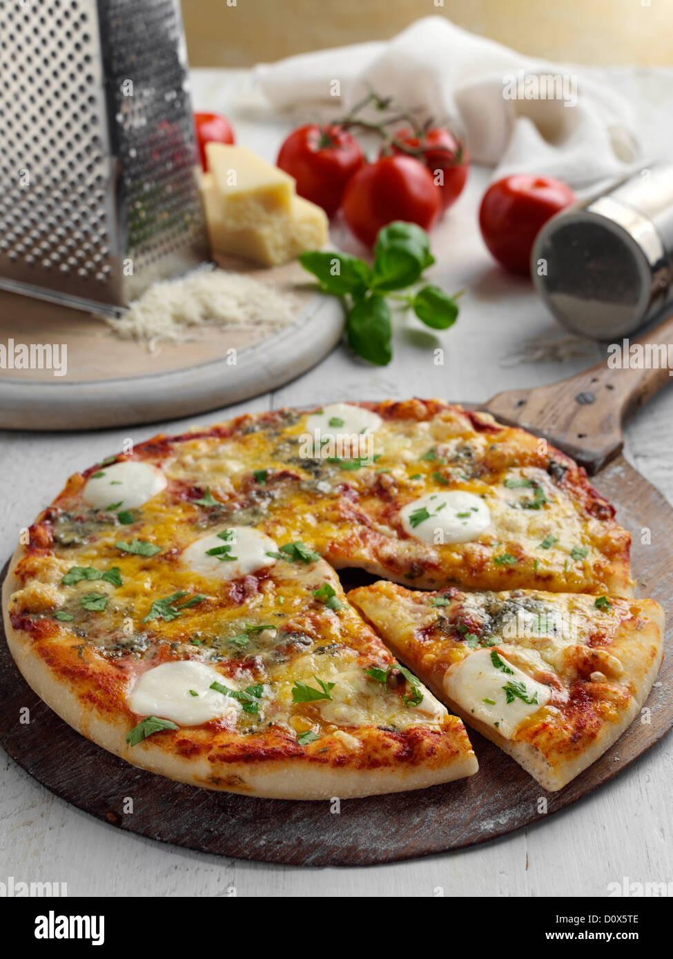 Four cheeses pizza Stock Photo - Alamy