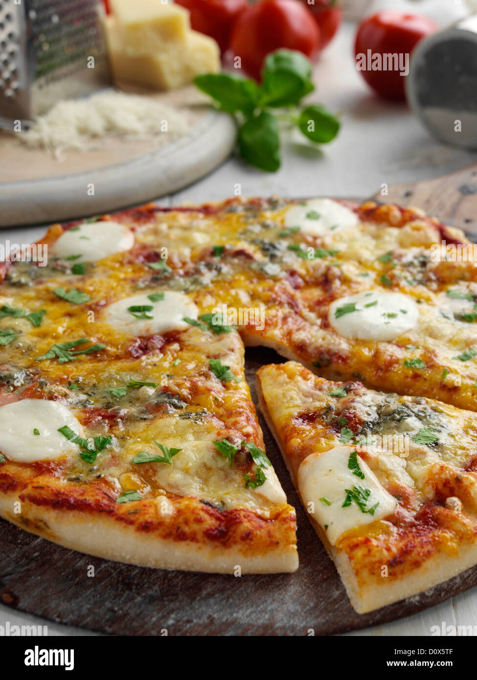 Four cheeses pizza Stock Photo - Alamy