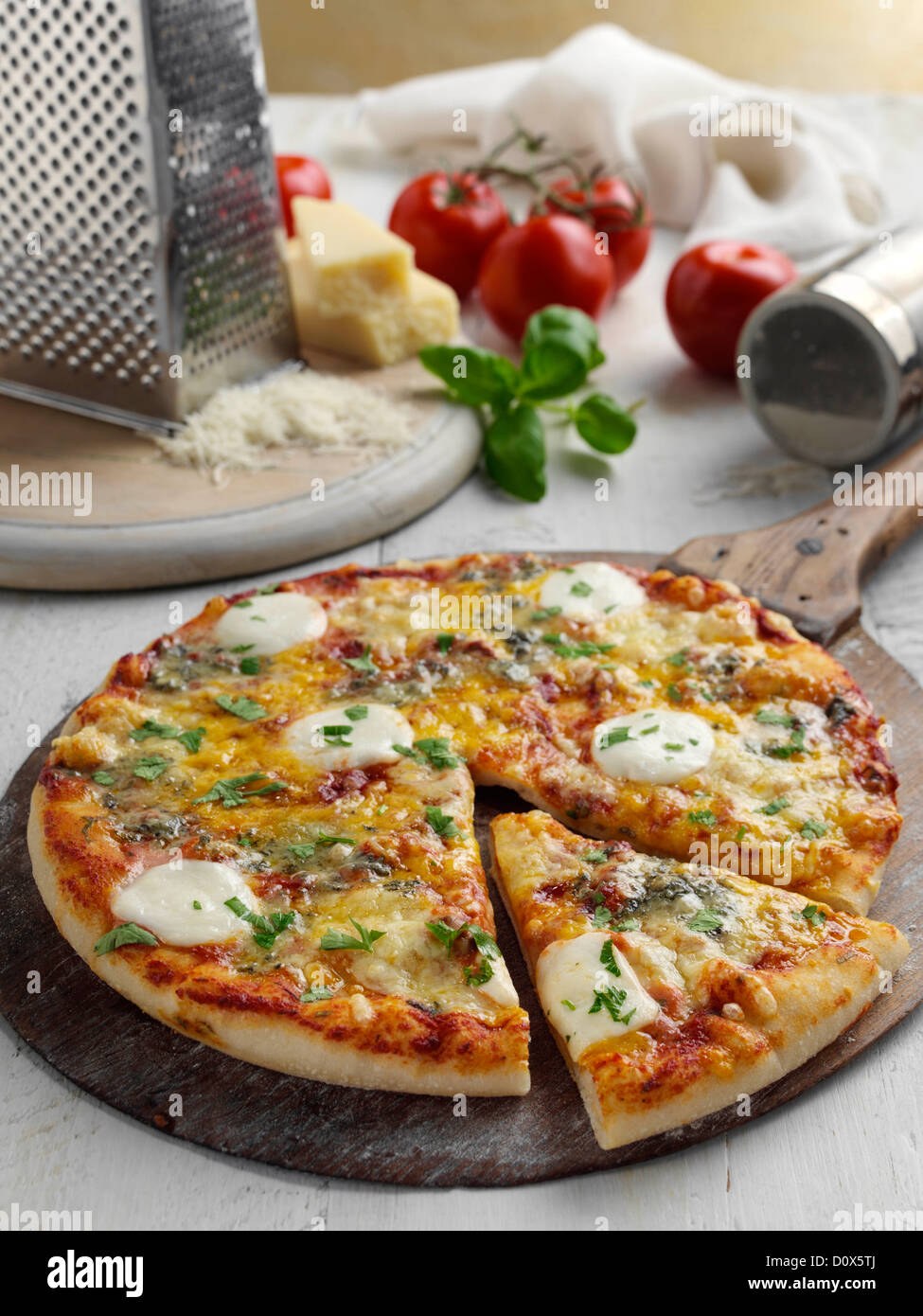 Four cheeses pizza Stock Photo - Alamy