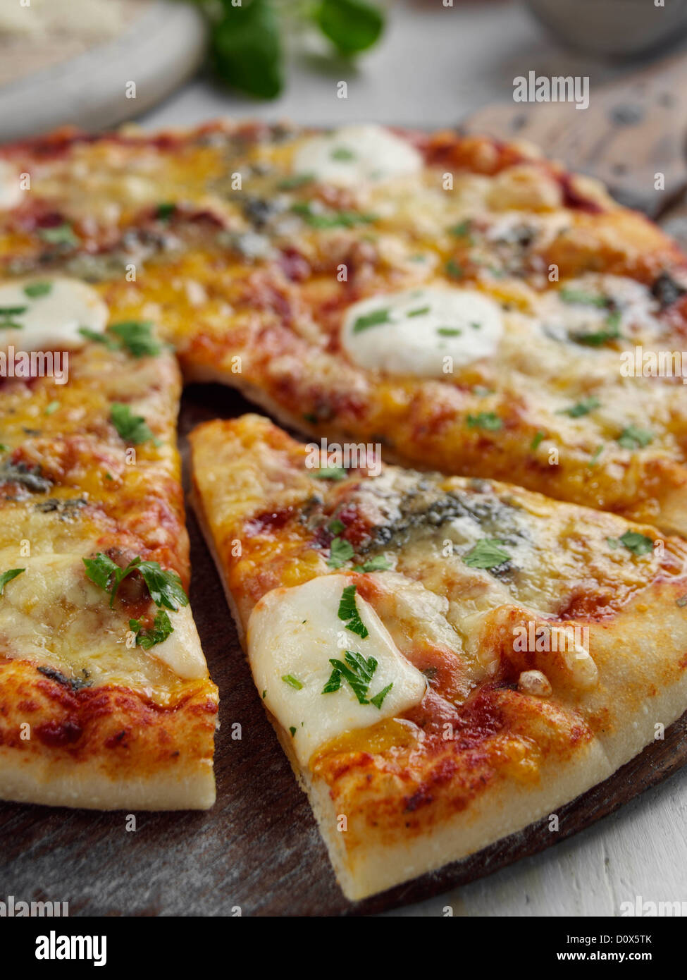 Four cheeses pizza Stock Photo - Alamy