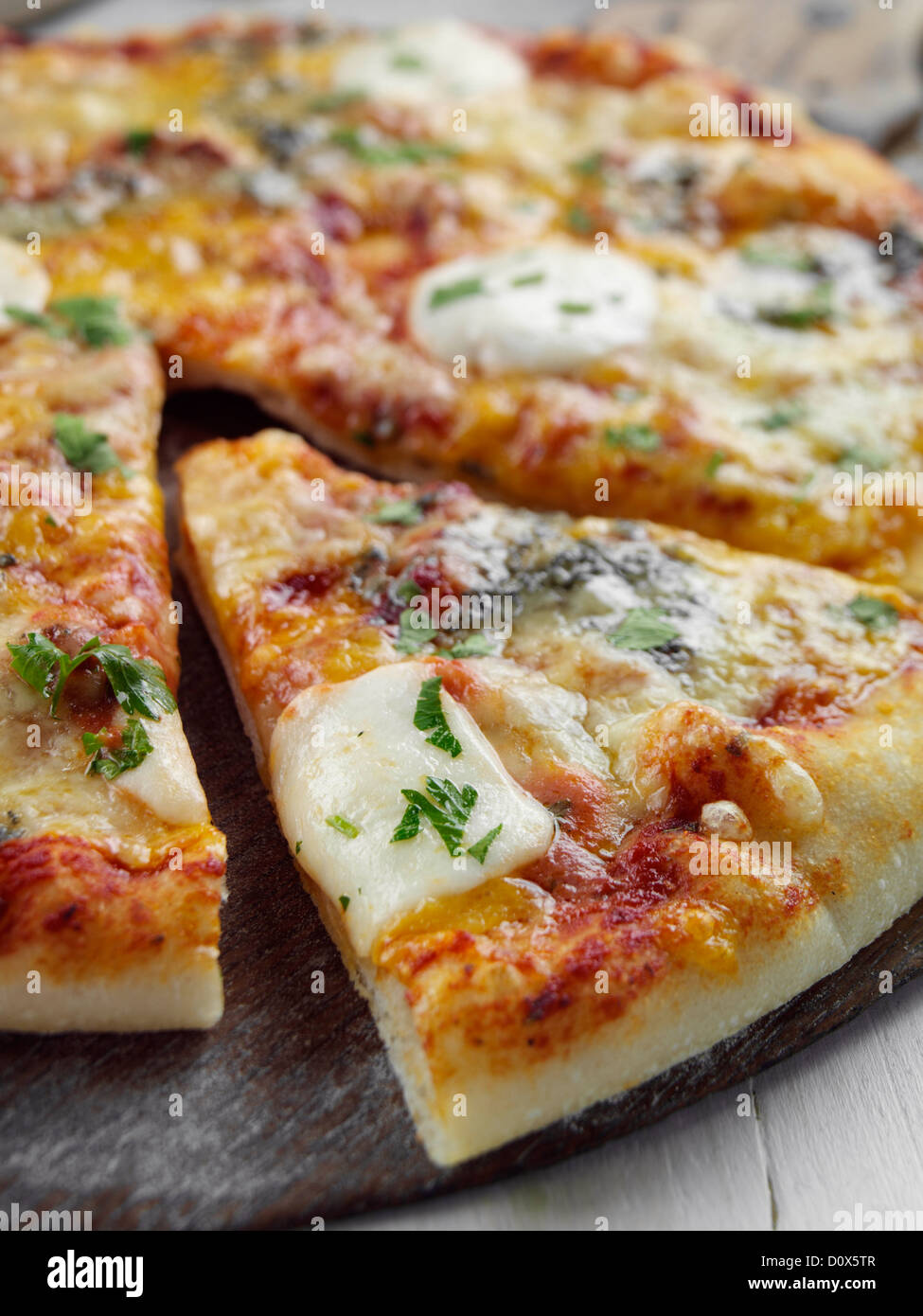 Four cheeses pizza Stock Photo - Alamy