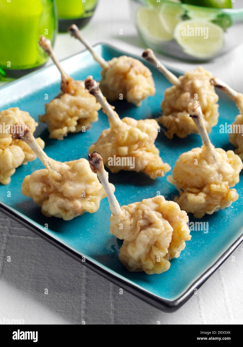 Angel wings deep fried battered chicken canapes hi-res stock ...