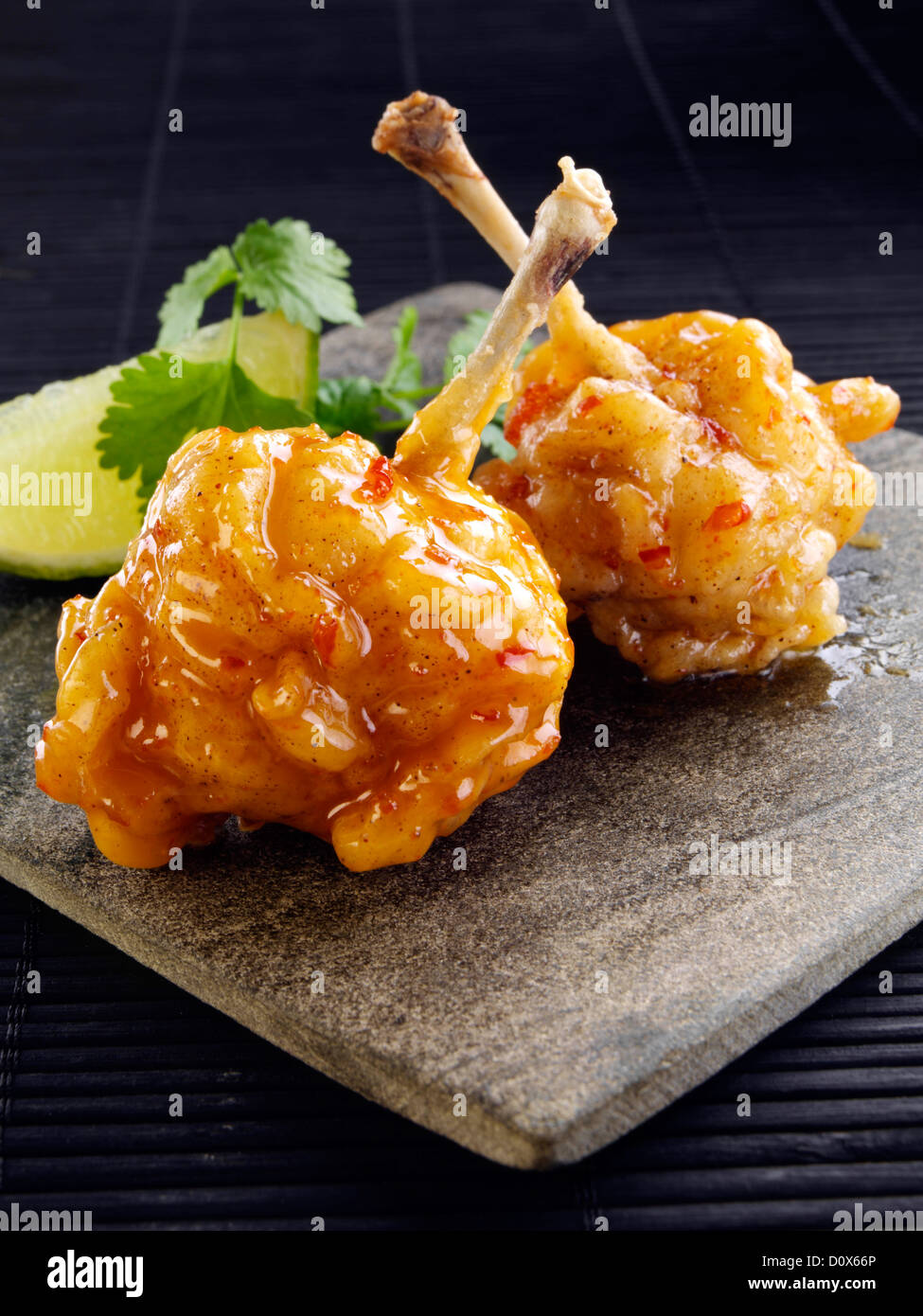 Angel wings deep fried battered chicken canapes hi-res stock ...