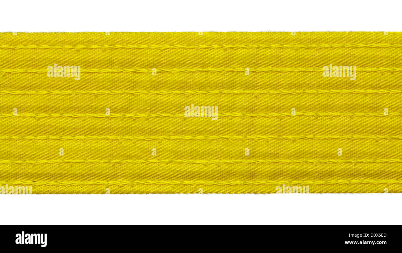 Karate yellow belt closeup isolated on white background Stock Photo - Alamy
