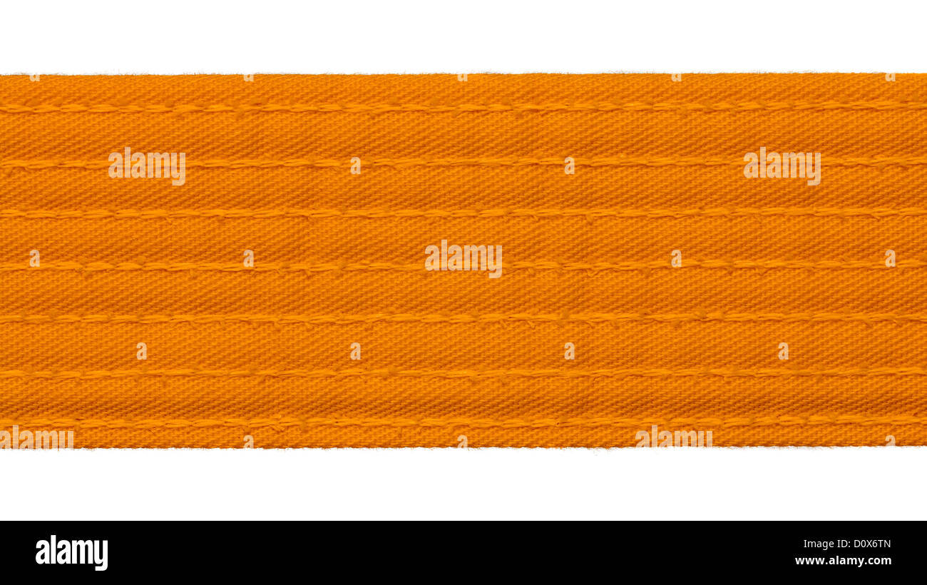 Karate orange belt closeup isolated on white background Stock Photo - Alamy