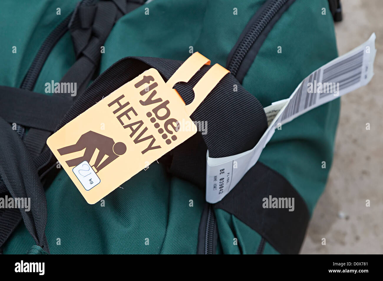 Airline bag with Flybe heavy tag, UK Stock Photo - Alamy