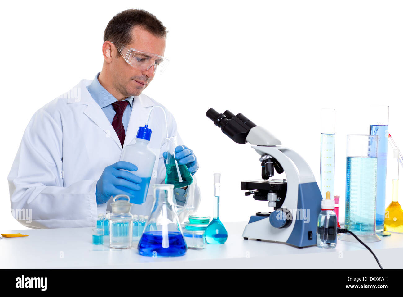 laboratory scientist working at lab with test tubes and microscope ...
