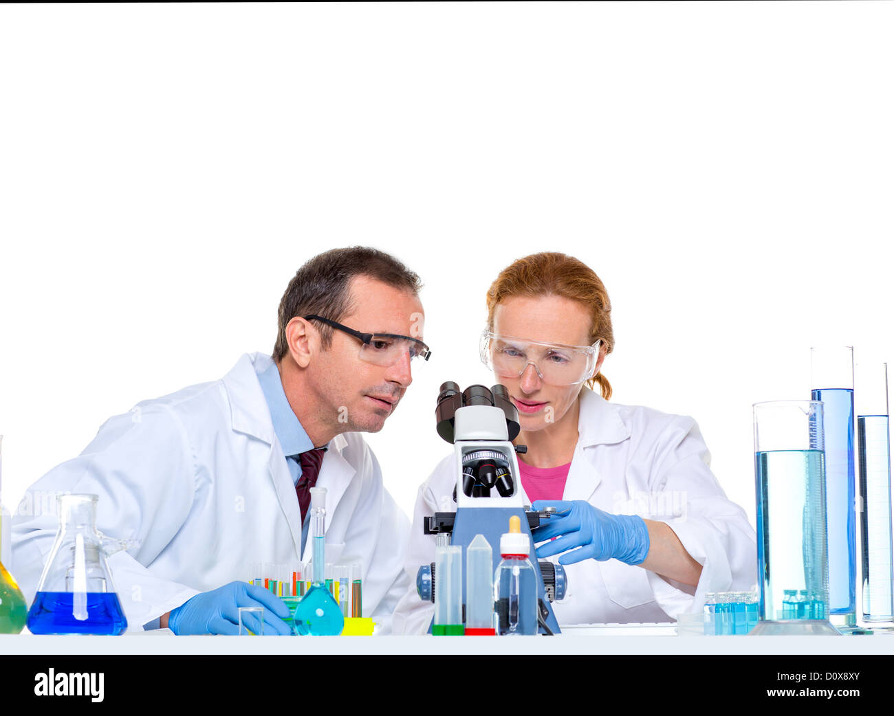 chemical laboratory with two scientist working with test tubes and ...