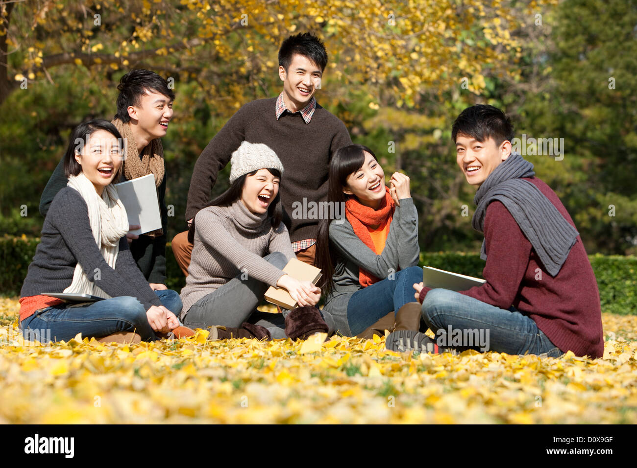 Excited college students on campus in a beautiful autumn day Stock ...