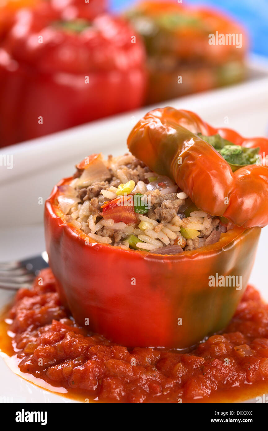 Baked stuffed red bell pepper filled with minced meat, onion, rice ...