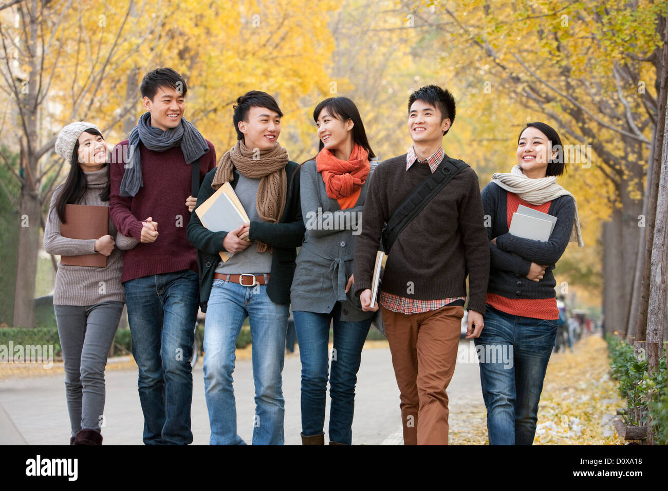 College students walking on campus in autumn Stock Photo - Alamy