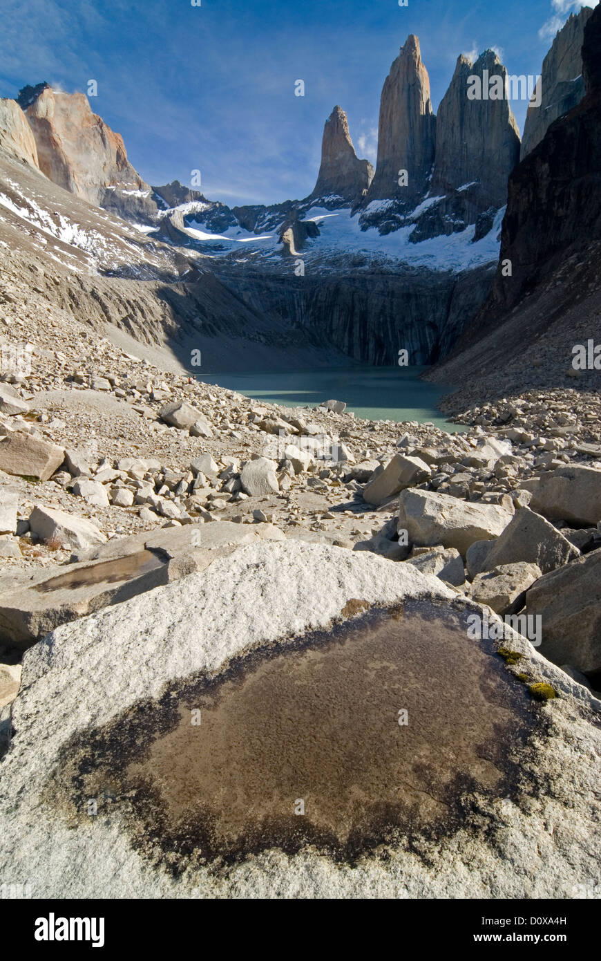 Pool on boulder below the granite spires of Torres Del Paine, Torres ...
