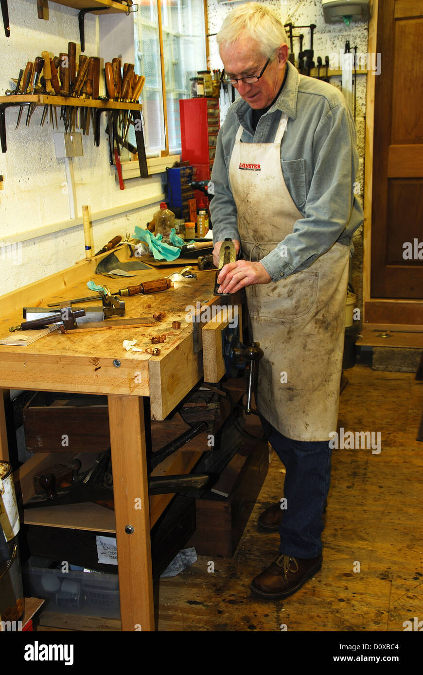 A woodworker working in his workshop UK Stock Photo - Alamy