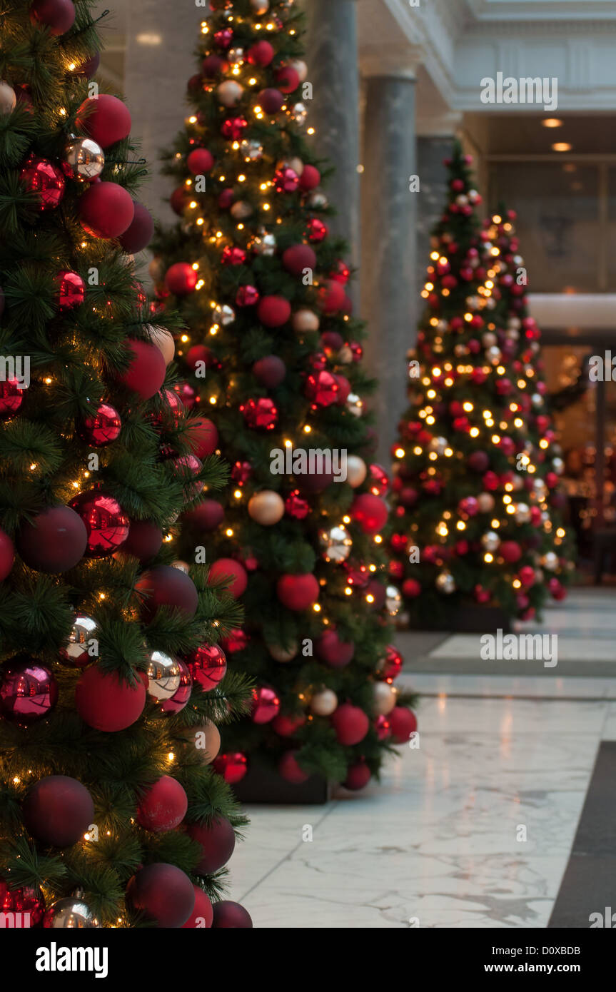 Christmas tree red decorations with spot light out of focus on the ...