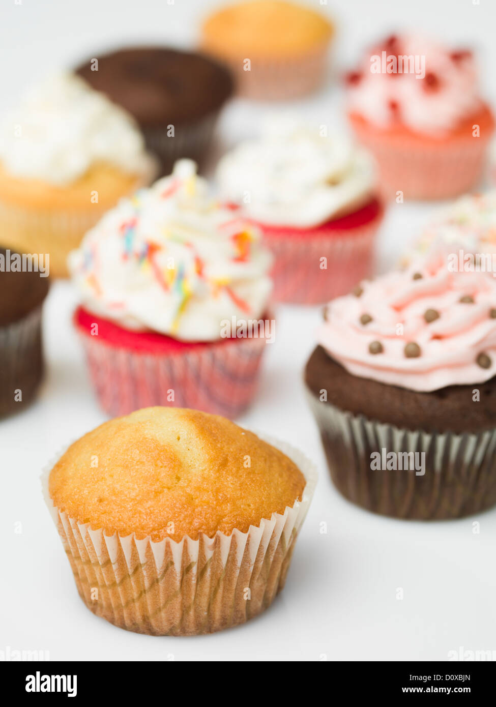 group of multicolored ornate details muffins white background Stock ...
