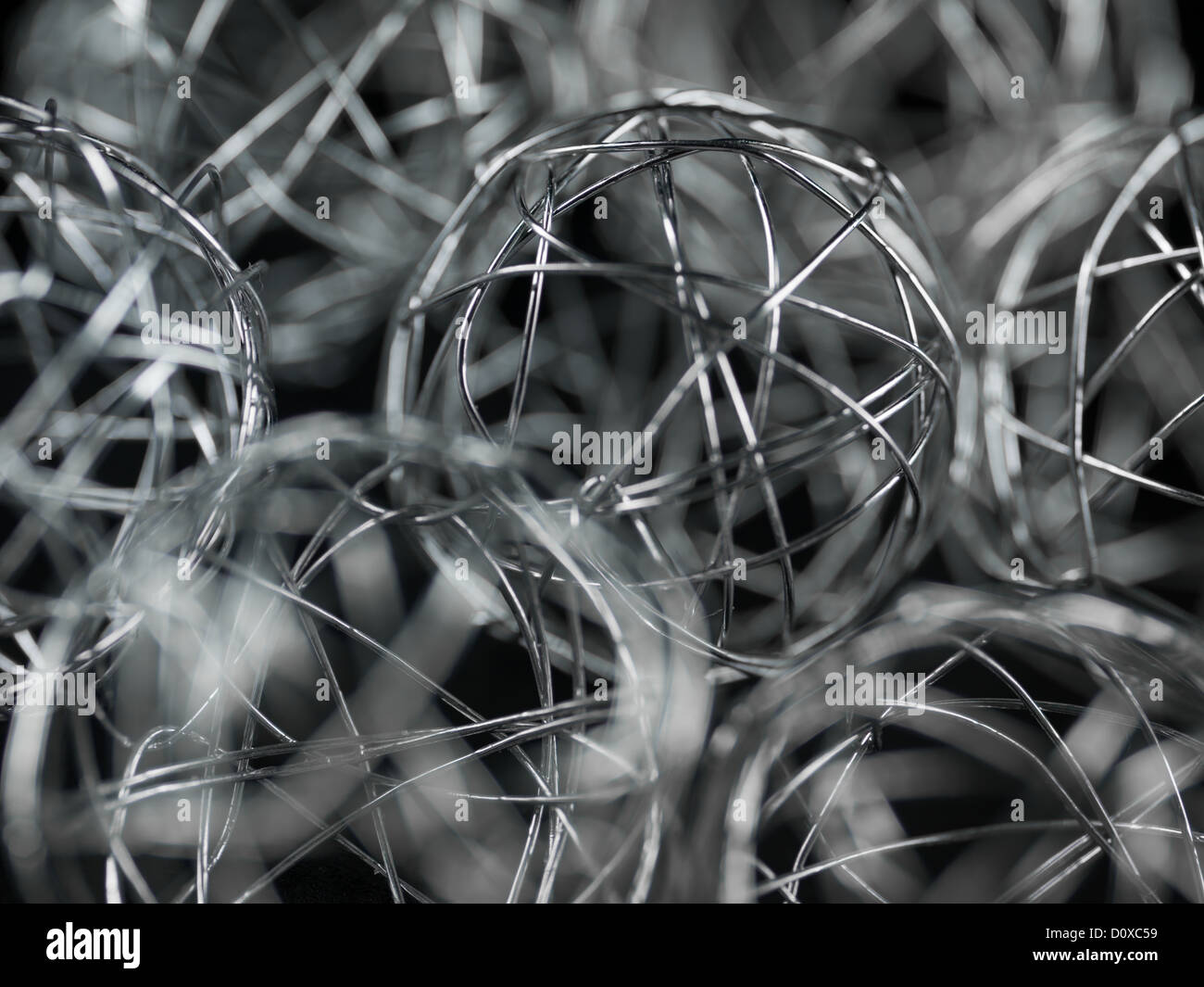Wire recycled many balls on black background Stock Photo - Alamy