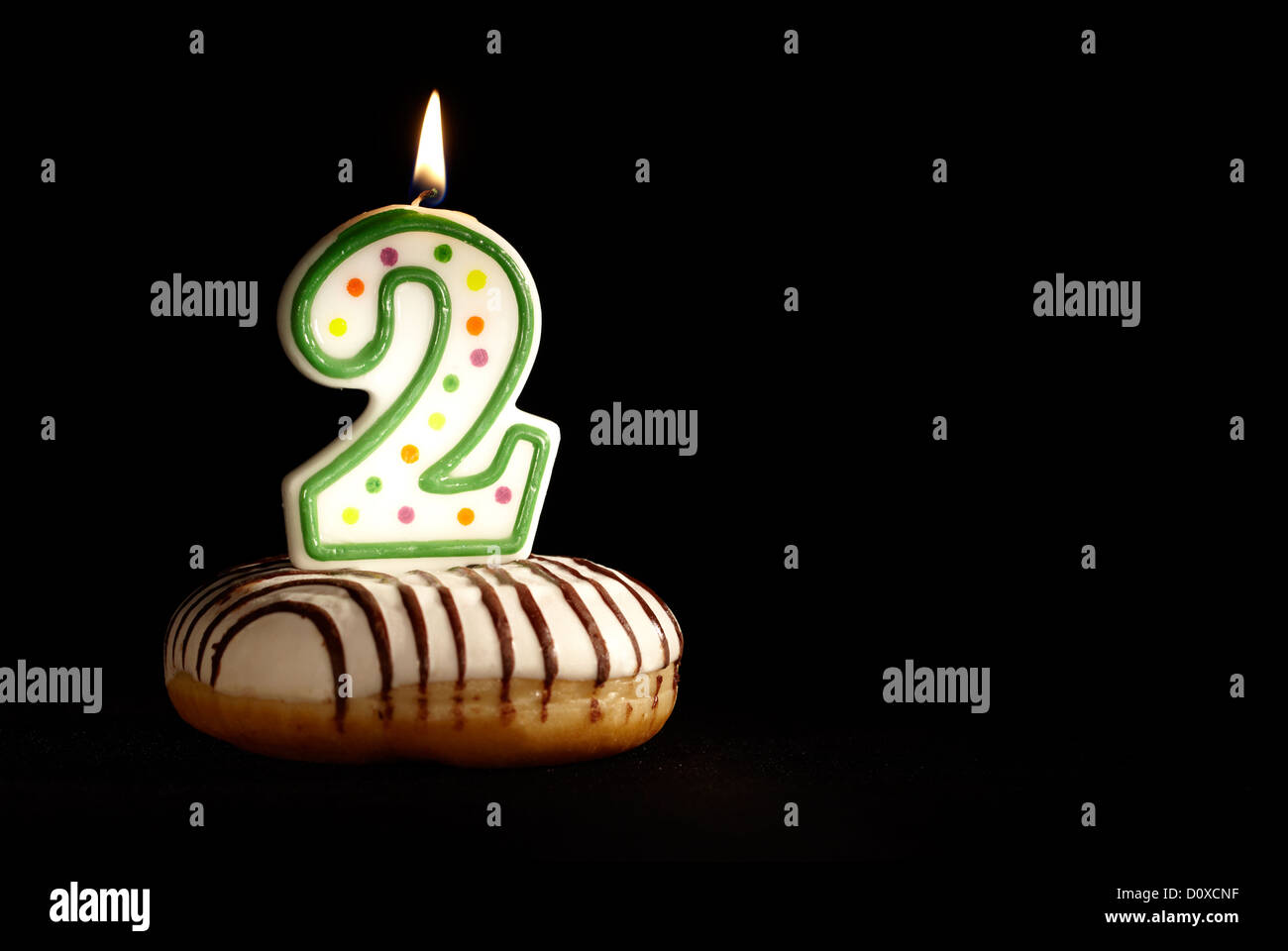 Birthday candle 2 years hi-res stock photography and images - Alamy