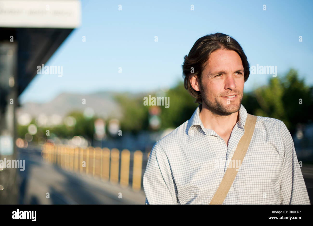 Confident male commuter Stock Photo - Alamy