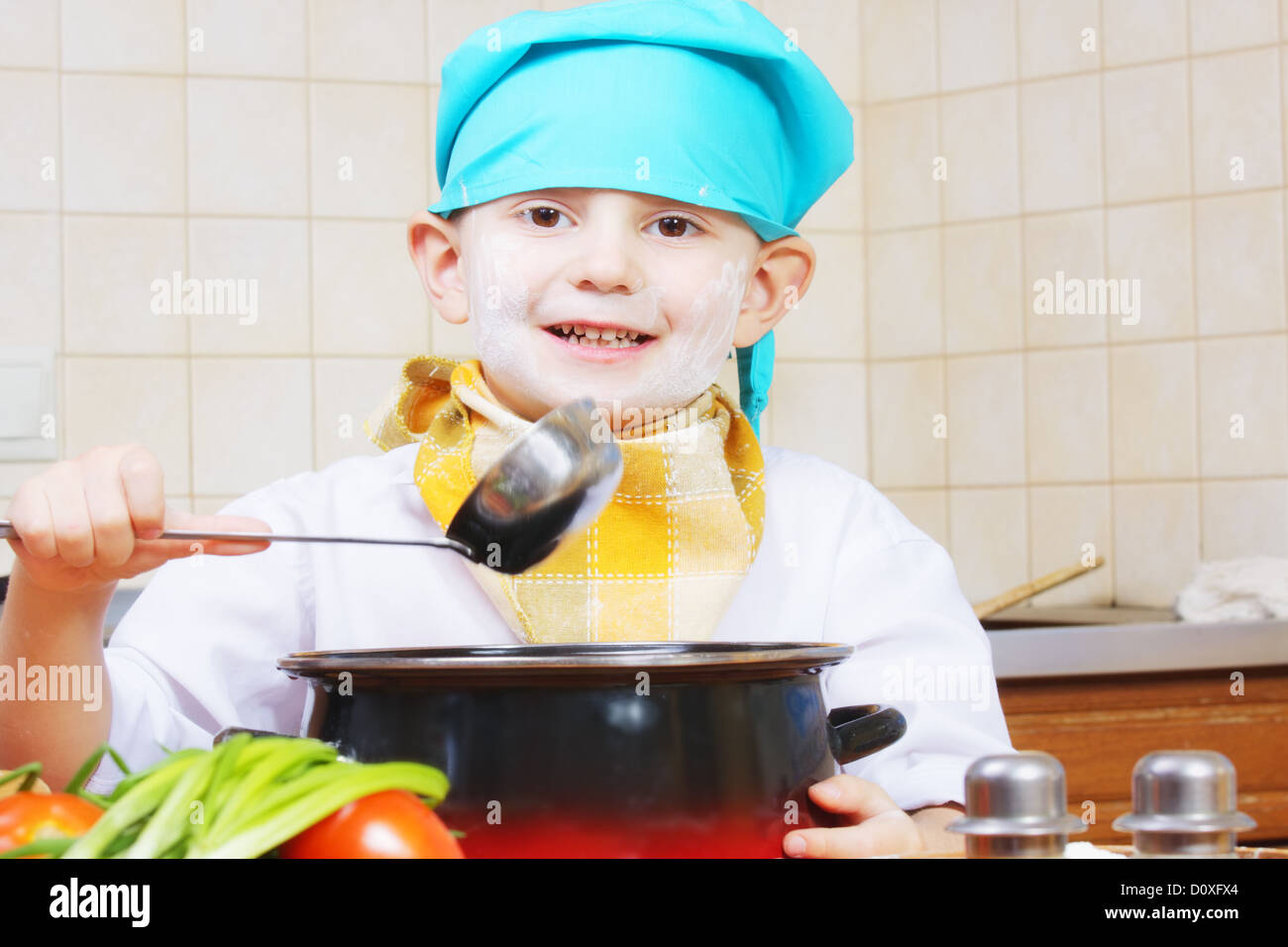 Happy little cook Stock Photo - Alamy
