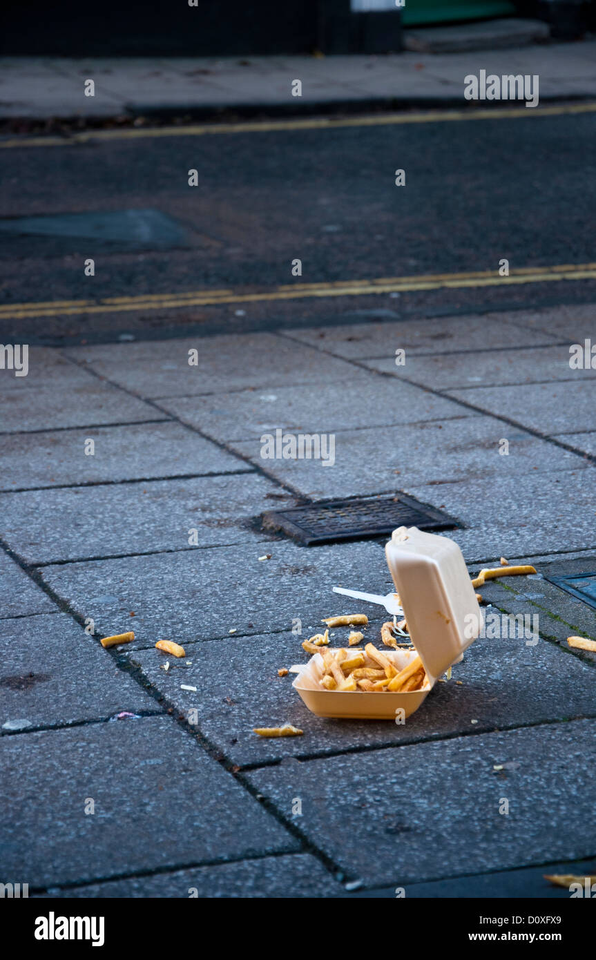 Discarded chips and wrappers fast food litter Stock Photo - Alamy