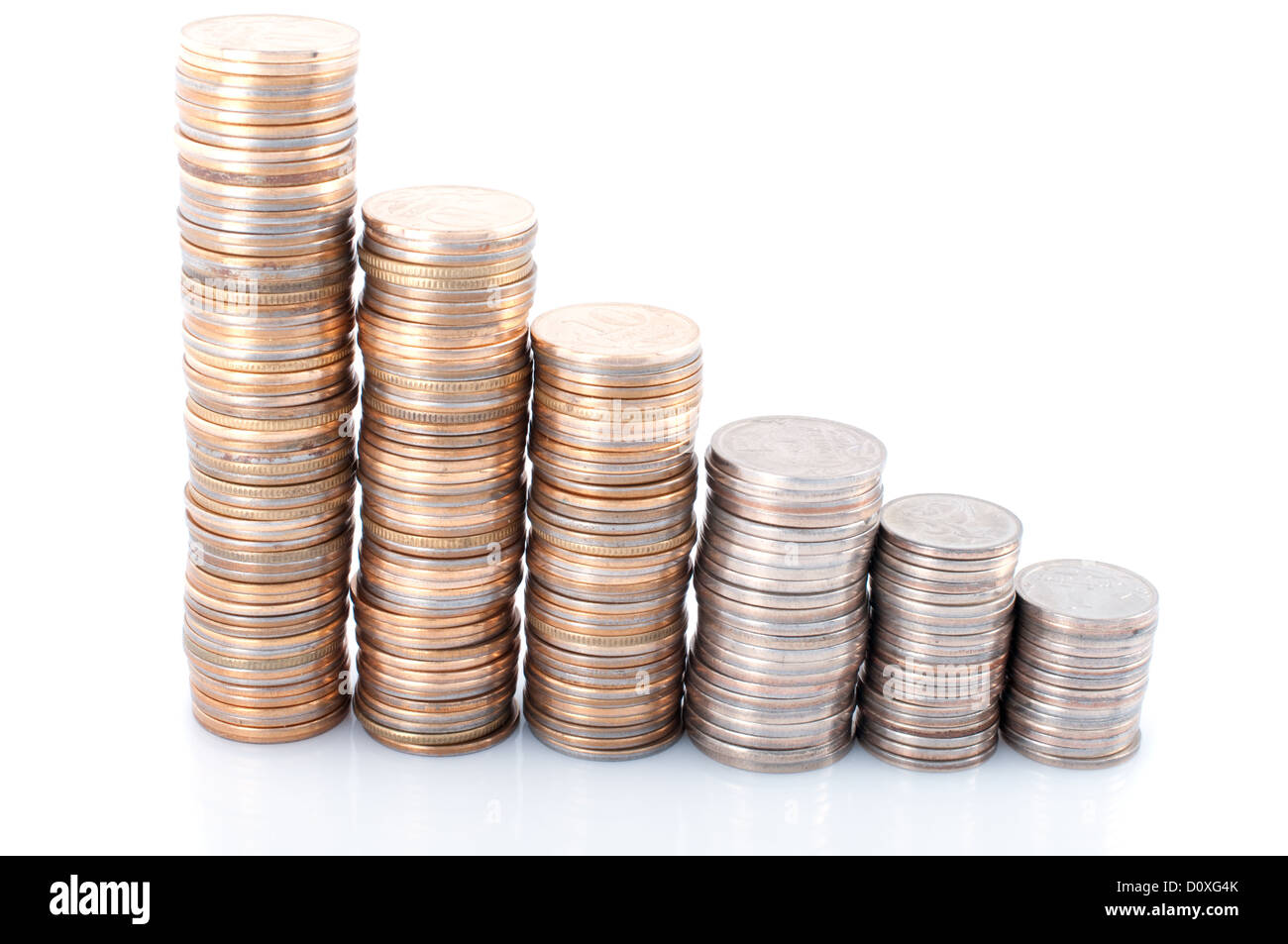 Coins towers on white background Stock Photo - Alamy