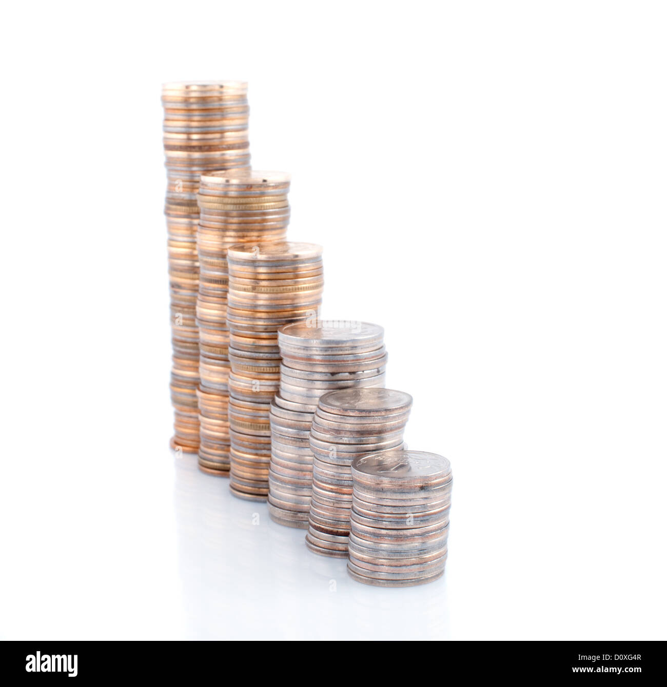 Coins towers on white background Stock Photo - Alamy