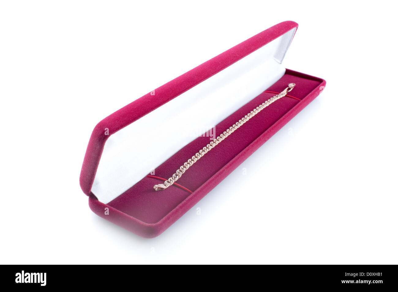 Gold bracelet in red gift packing Stock Photo - Alamy