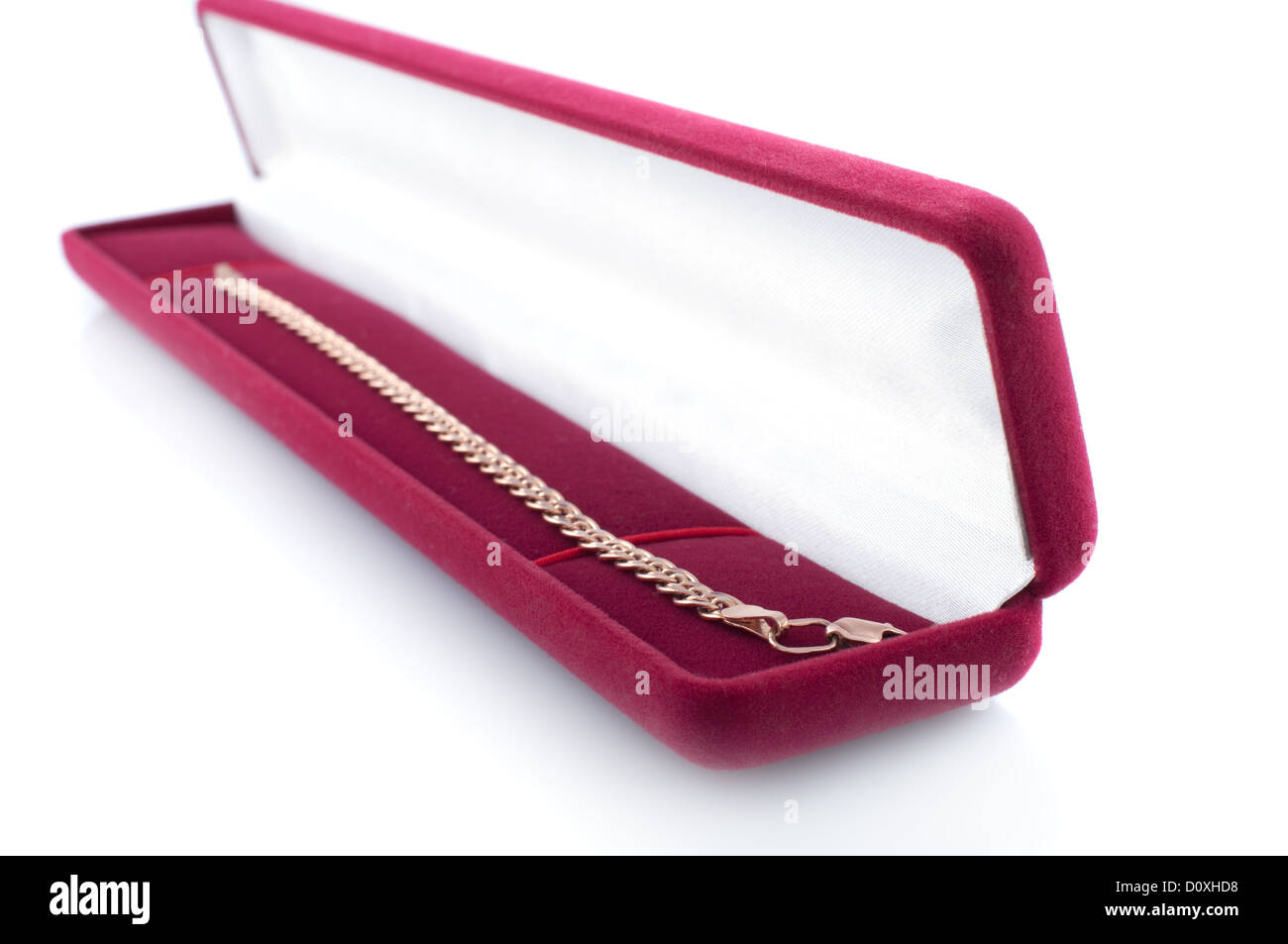 Gold bracelet in red gift packing Stock Photo - Alamy