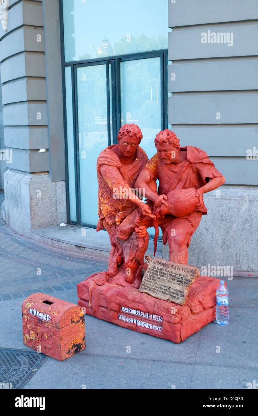 Living sculpture: The petrified twins. Madrid, Spain Stock Photo - Alamy