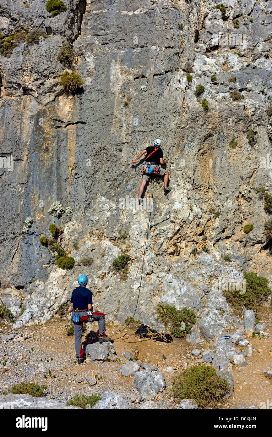 Two rock climbers starting climb, Kalymnos, Greece Stock Photo - Alamy