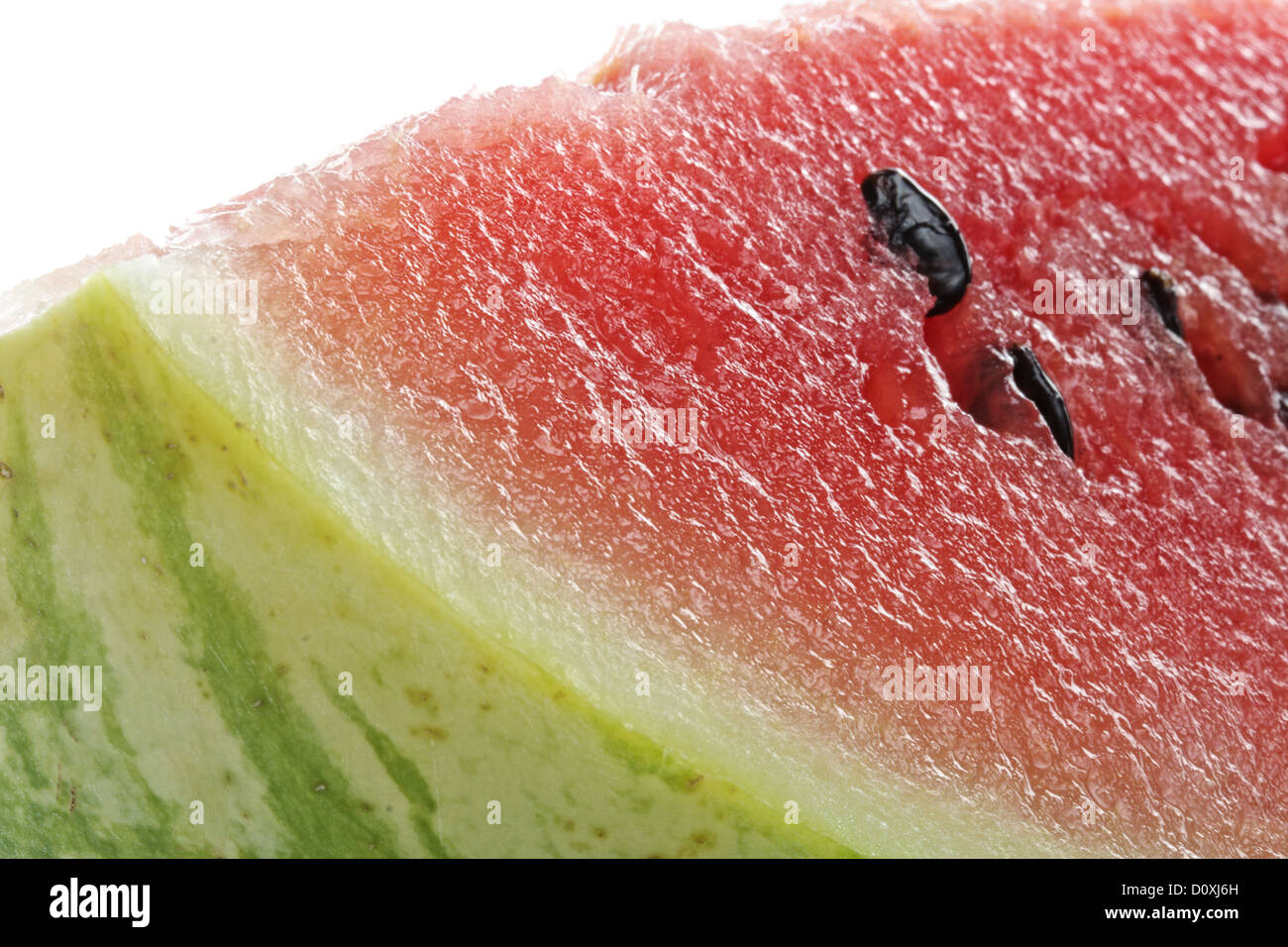 Watermelon slice closeup Stock Photo - Alamy