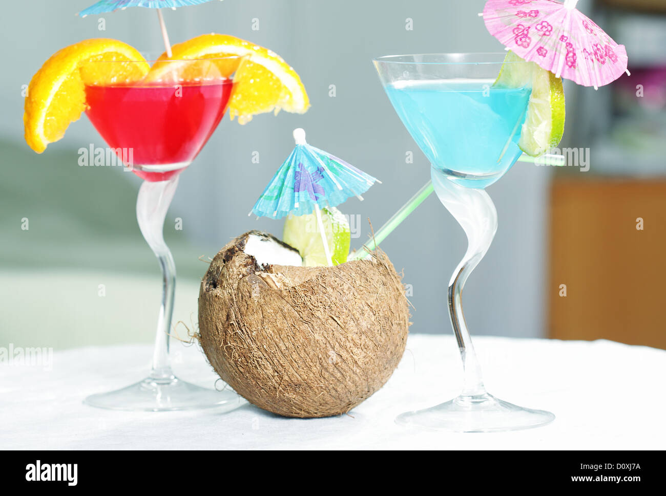 Tropical cocktails on table Stock Photo - Alamy