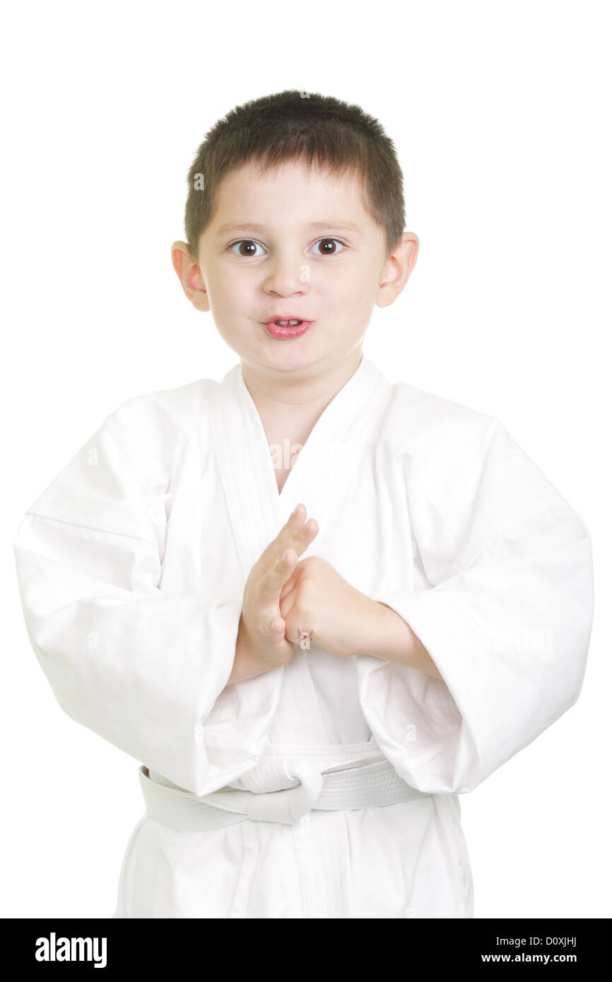 Karate kid in greeting stance Stock Photo - Alamy