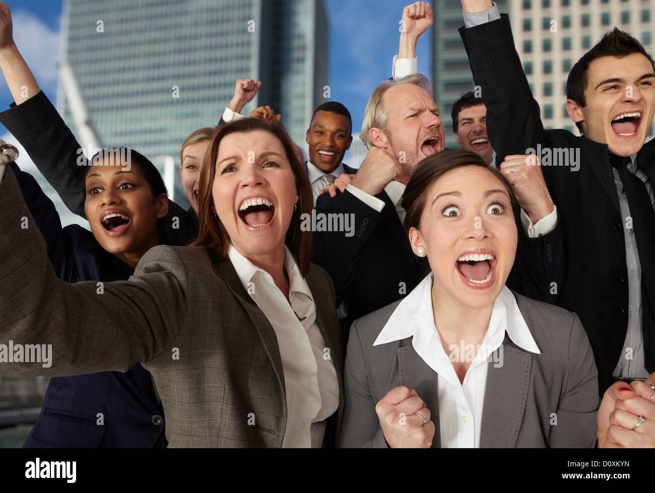 Businesspeople cheering with excitement Stock Photo - Alamy
