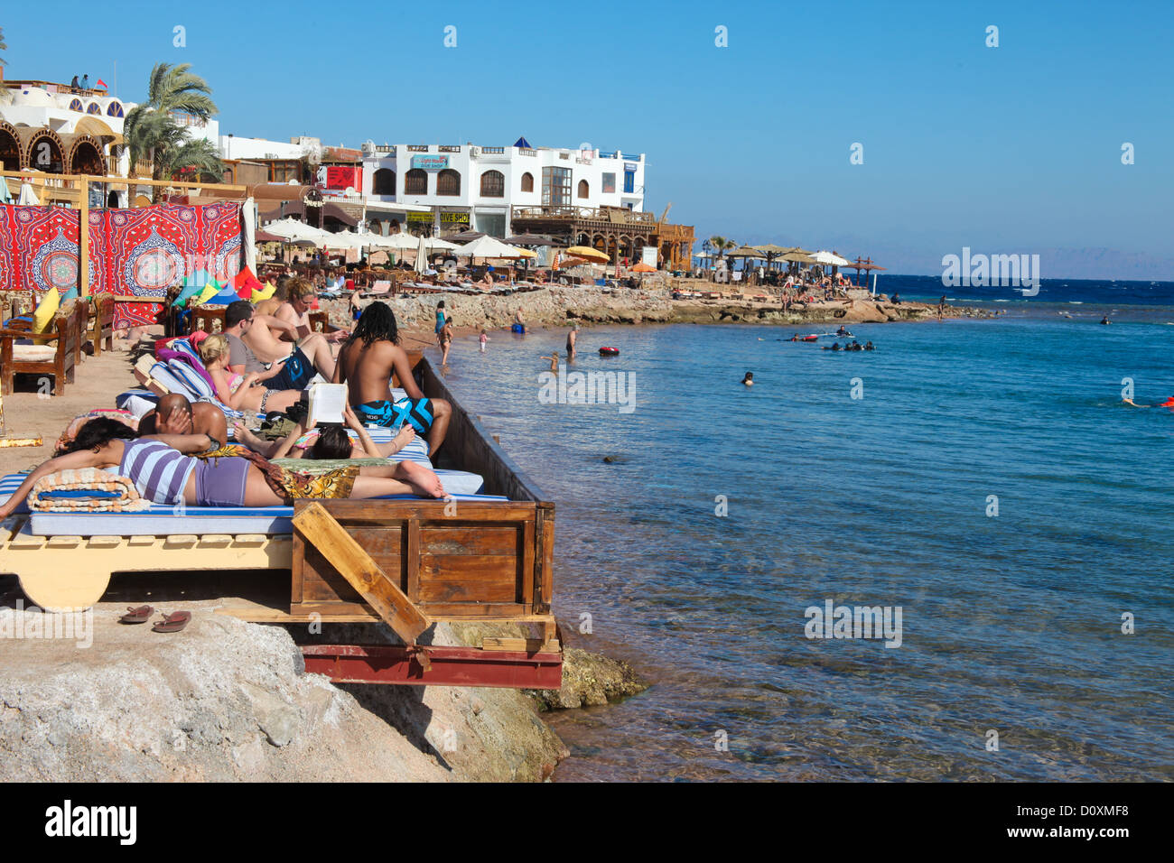 DAHAB - JANUARY 23. Tourists enjoying the Sinai coast in Dahab, Egypt ...