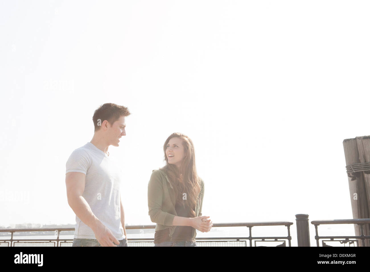 Young couple walking Stock Photo - Alamy