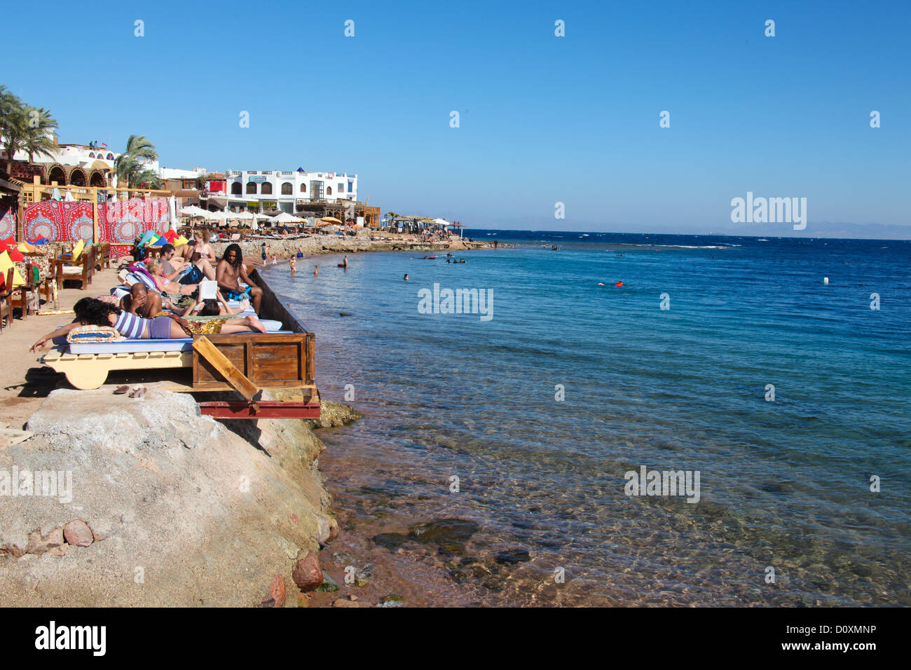 DAHAB - JANUARY 23. Tourists enjoying the Sinai coast in Dahab, Egypt ...