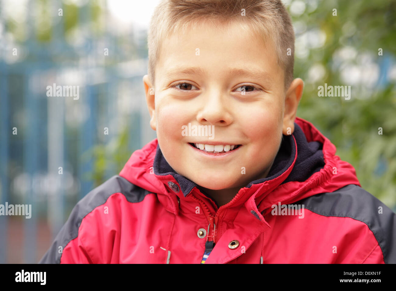 Smiling boy outdoors Stock Photo - Alamy