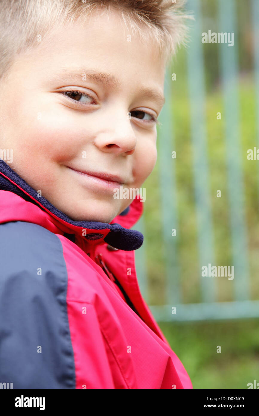 Positive boy turned head Stock Photo - Alamy