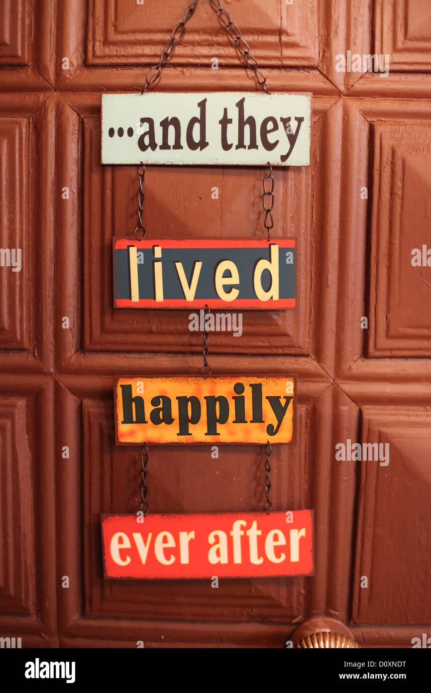 ...and they lived happily ever after door sign on chain Stock Photo - Alamy