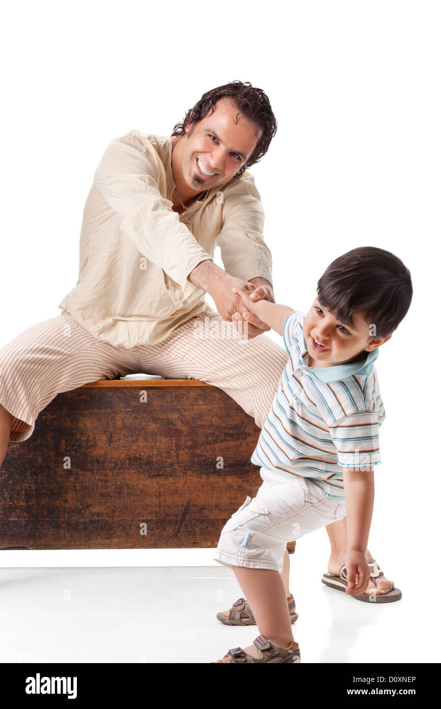 Father and little son studio portrait Stock Photo - Alamy