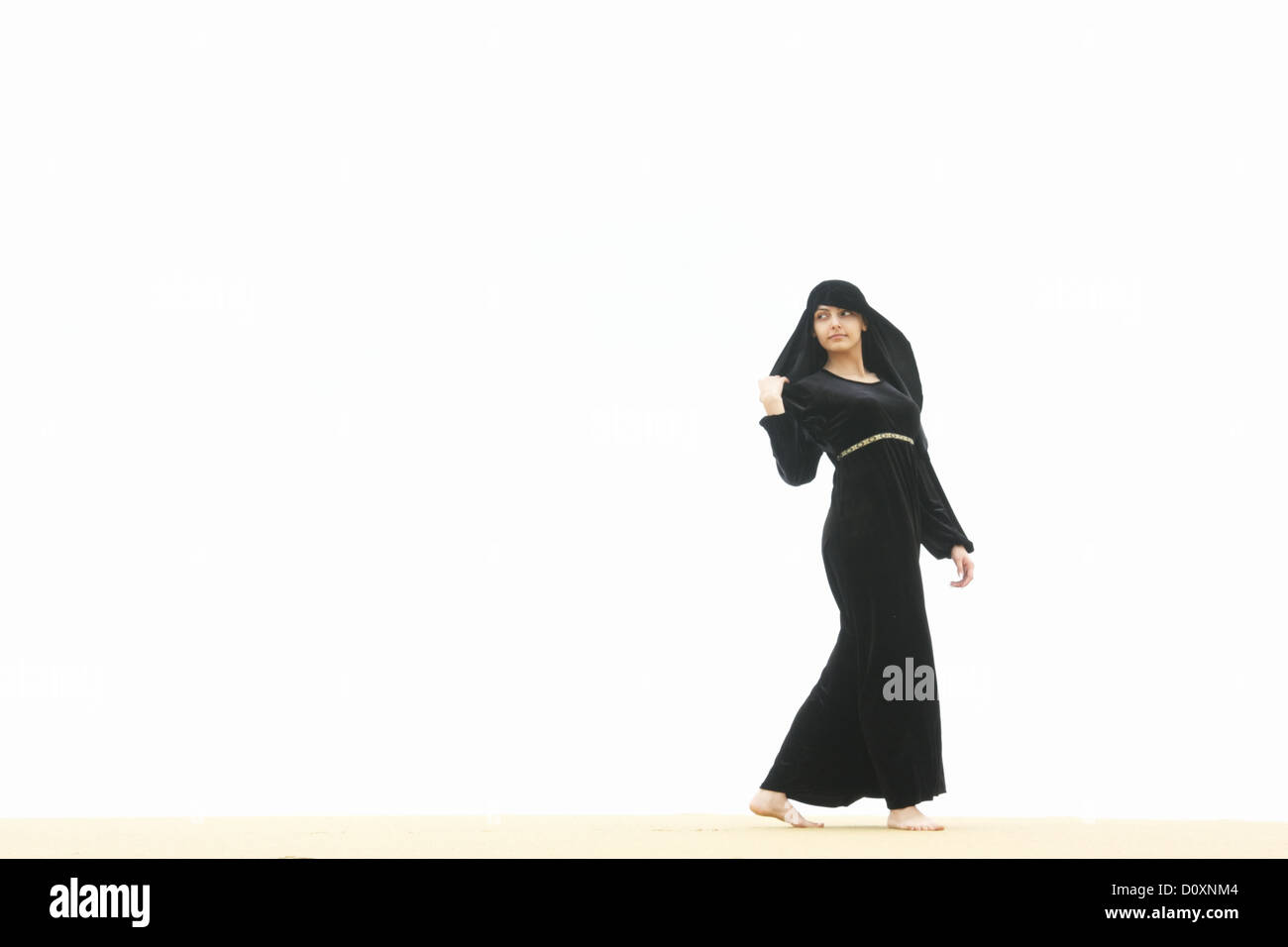 Shrouded woman hi-res stock photography and images - Alamy