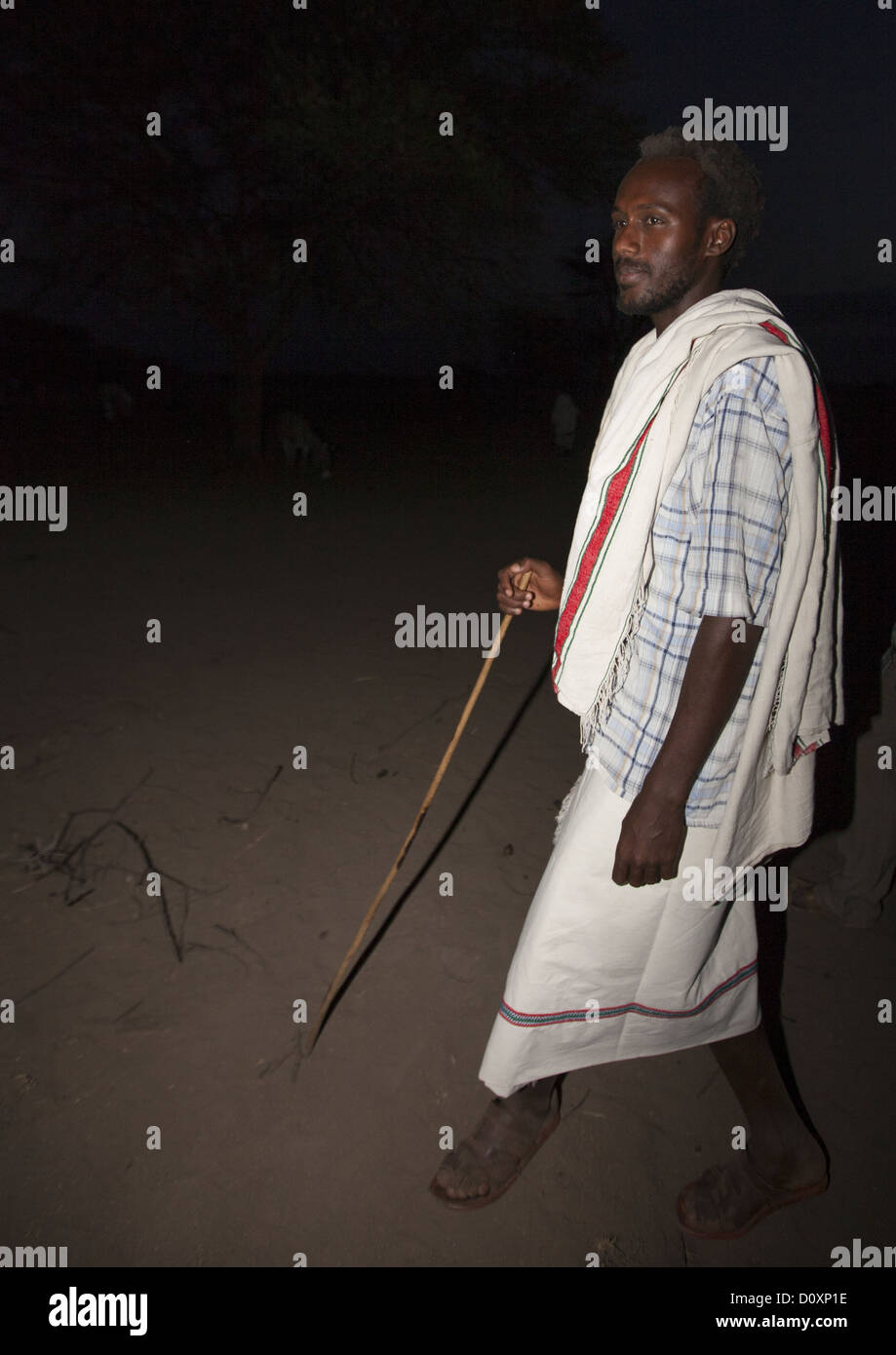 Night Shot Of A Karrayyu Tribe Man In Traditional Clothes During Gadaaa ...