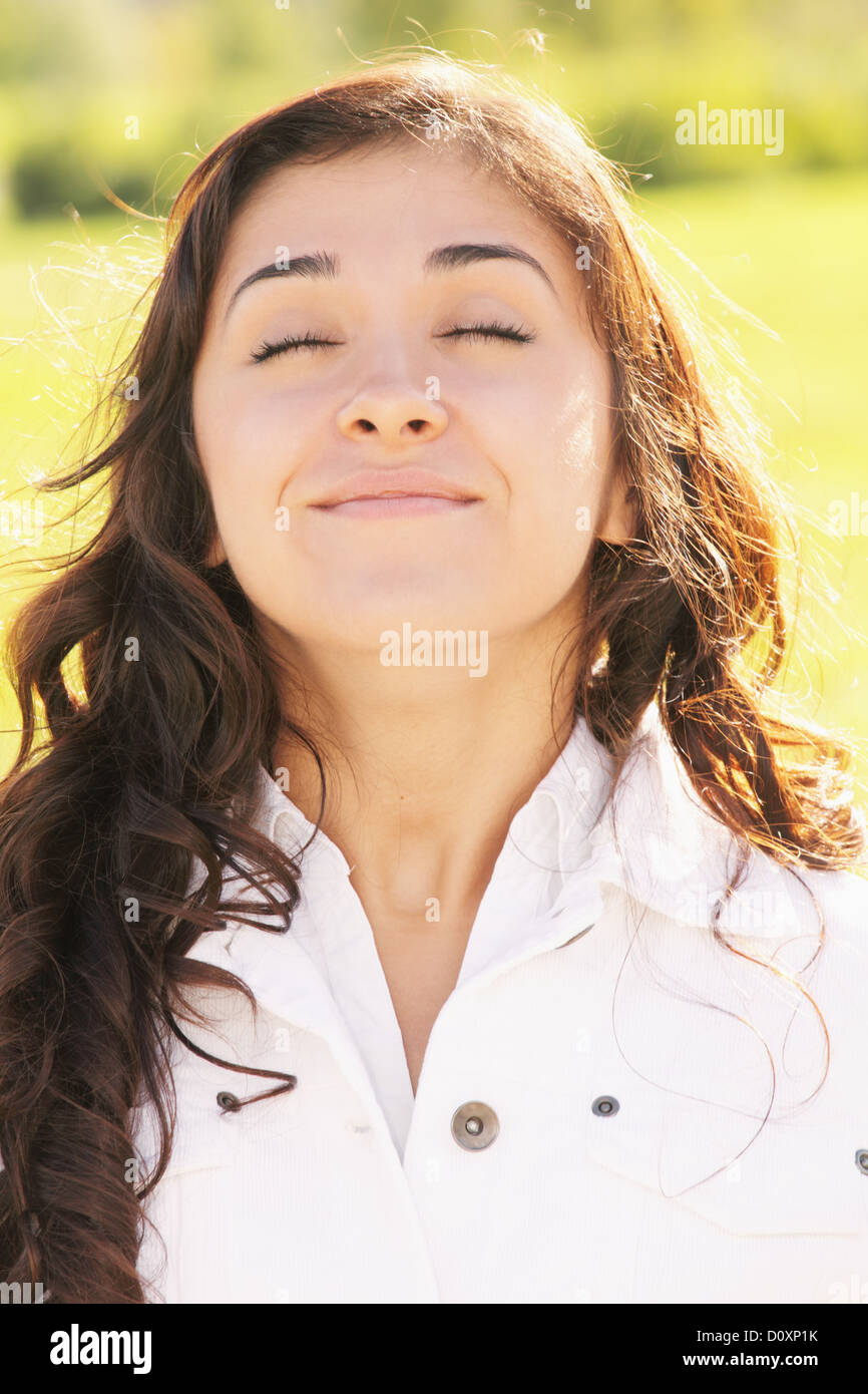 Young contented brunette Stock Photo - Alamy