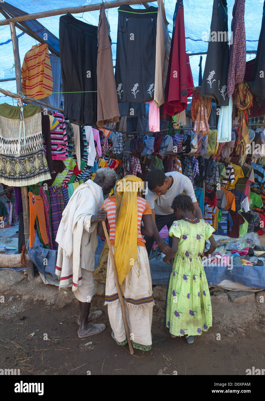 Karrayyu Tribe Family Looking At Goods On Display In Clothes Shop In ...