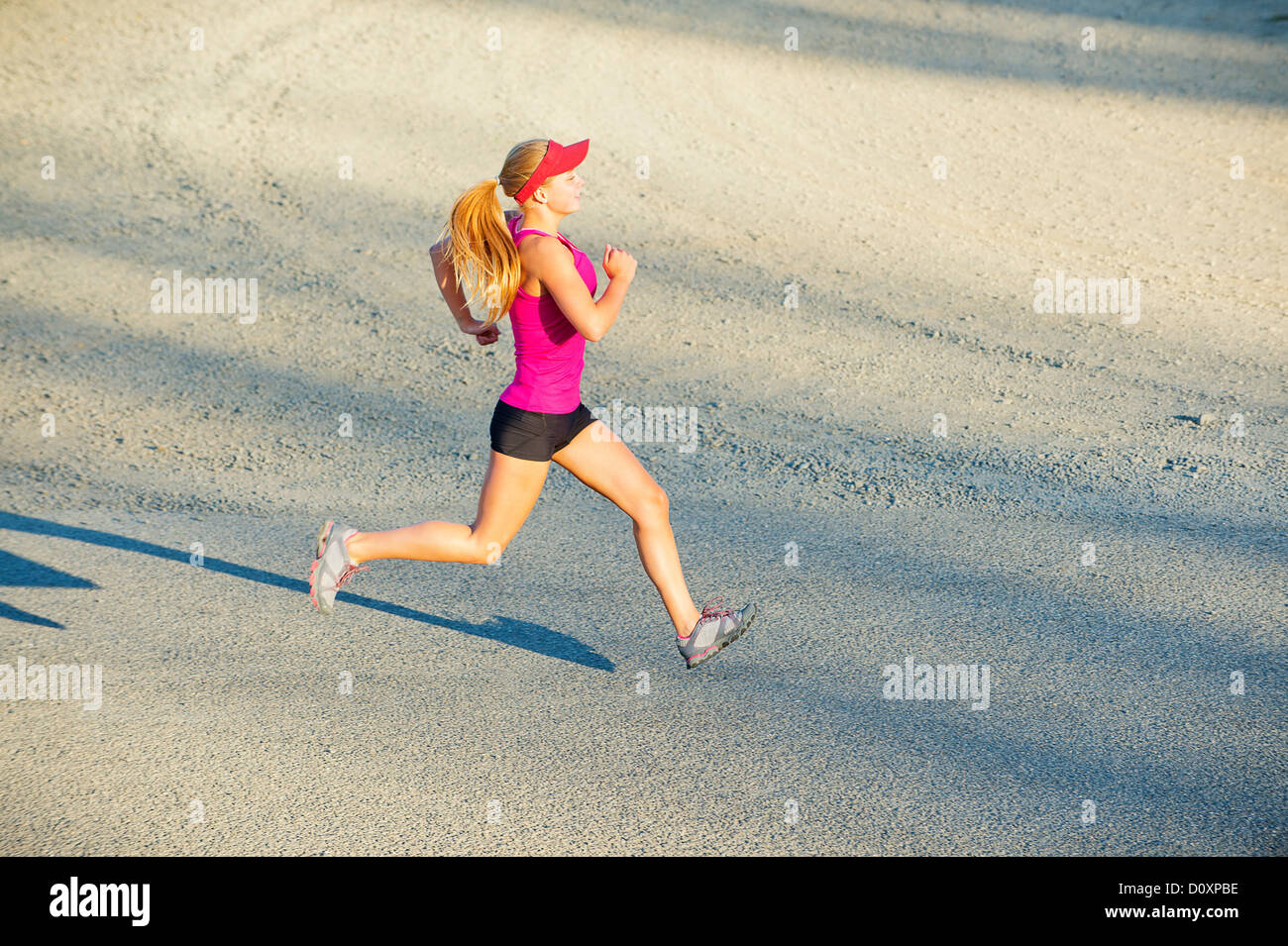 Teenage girl running Stock Photo - Alamy